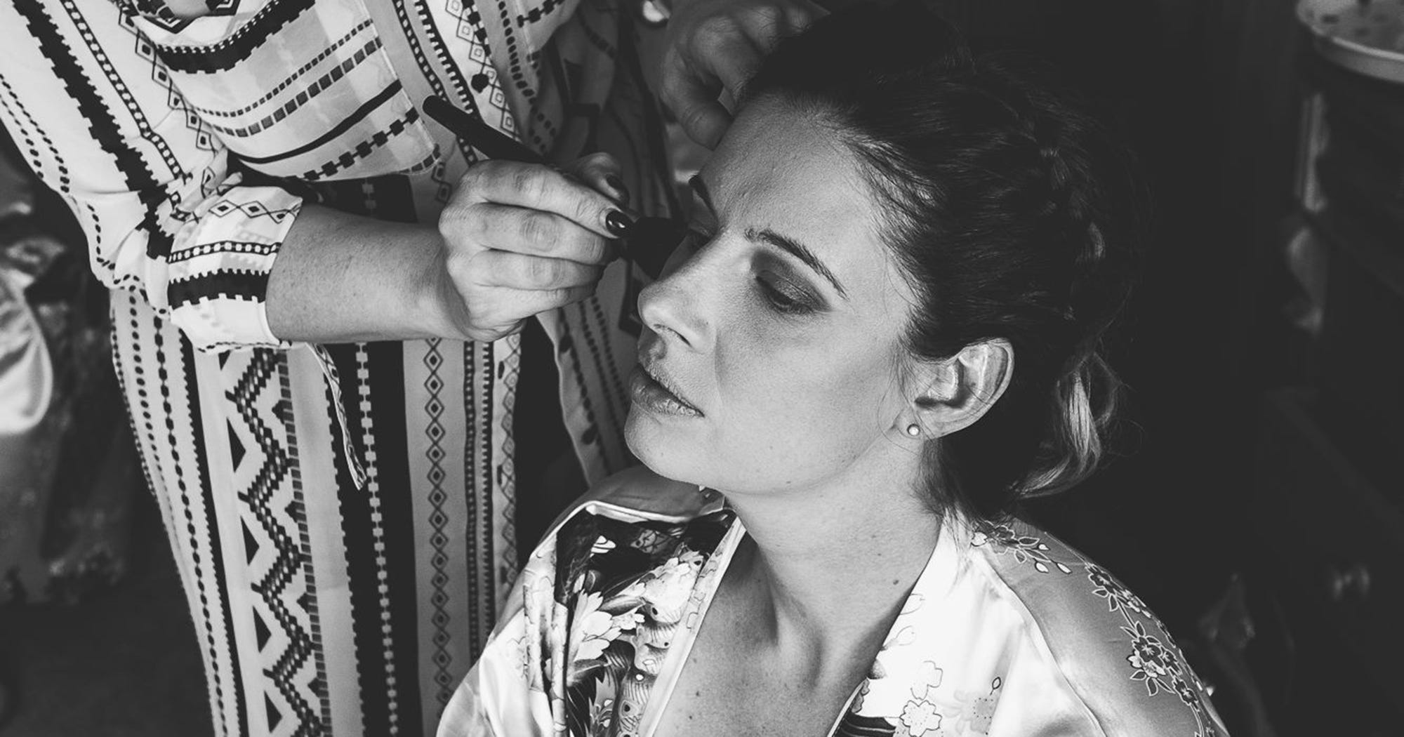 Mother Breastfeeding At Wedding